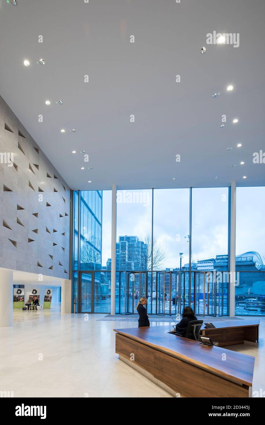 View from reception to Victoria. The large walnut desk is by Benchmark ...
