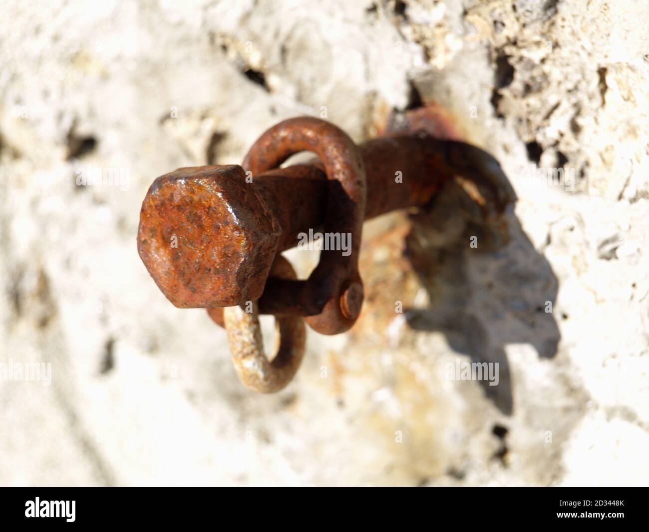 Rusty bolt in wall Stock Photo - Alamy