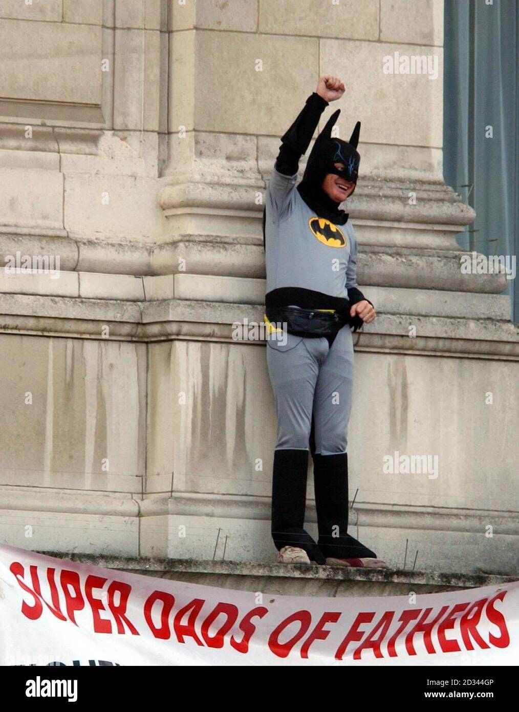 A Fathers 4 Justice campaigner dressed as Batman on a balcony of ...