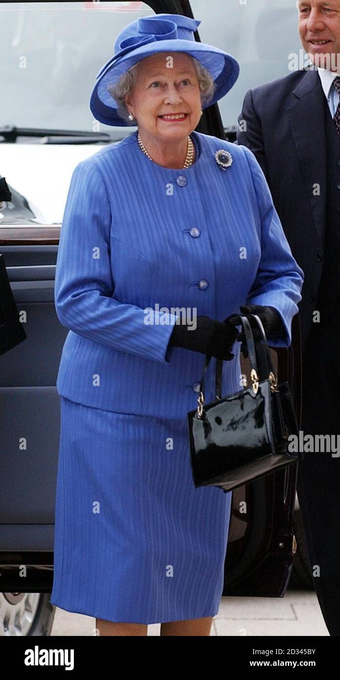 Britain's Queen Elizabeth II arrives at Lambeth Academy in Clapham ...