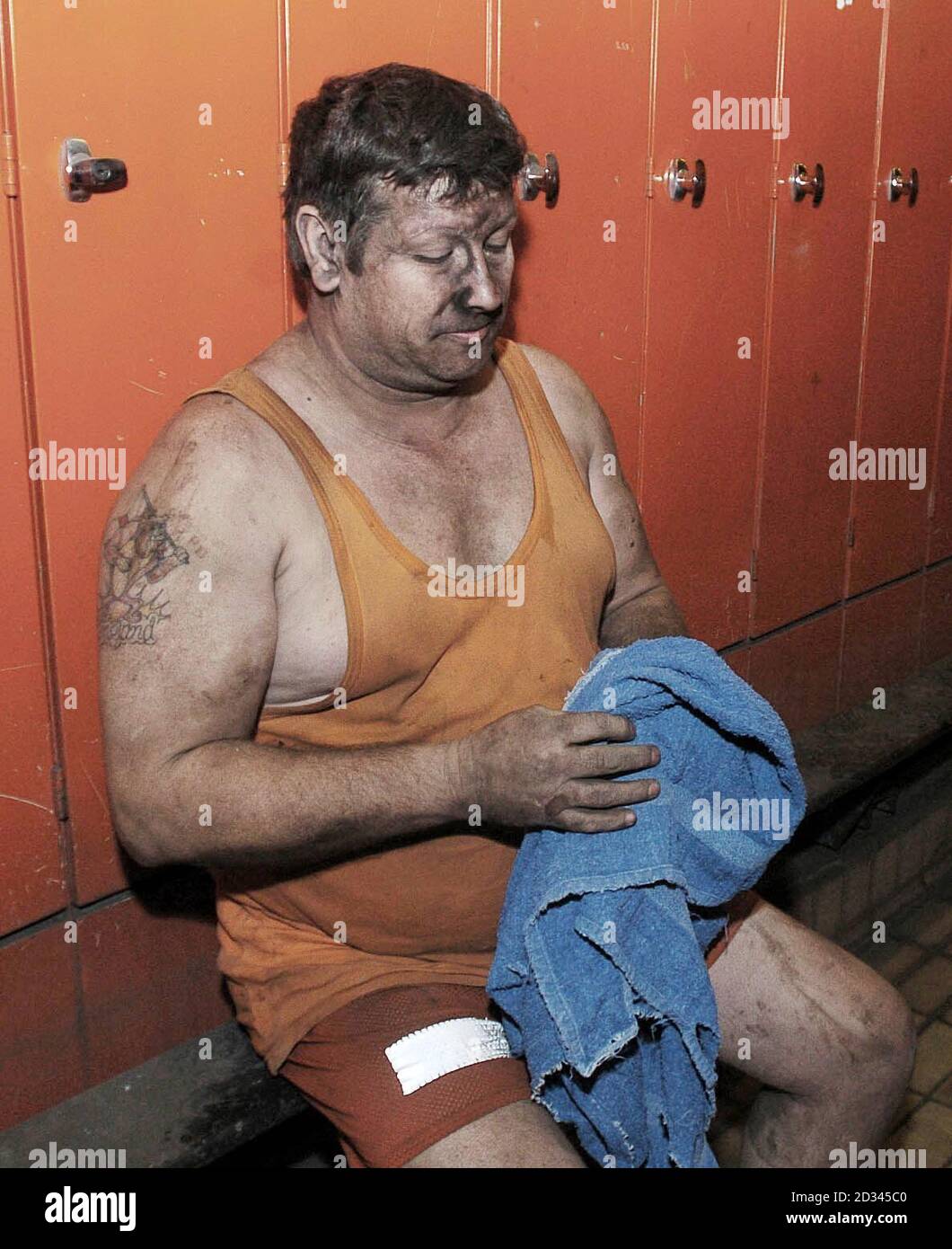 A miner sits in the changing rooms at the Riccall pit where coal ...