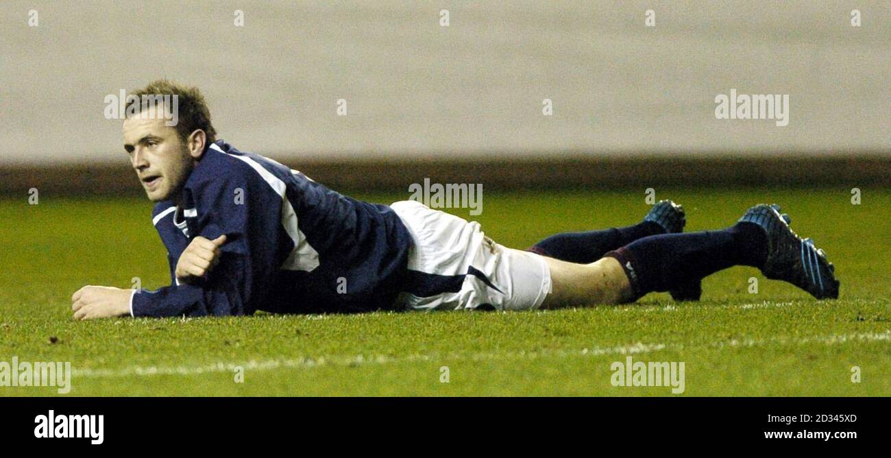 Arsenal captain tony adams proudly hold premiership trophy fa cup hi ...