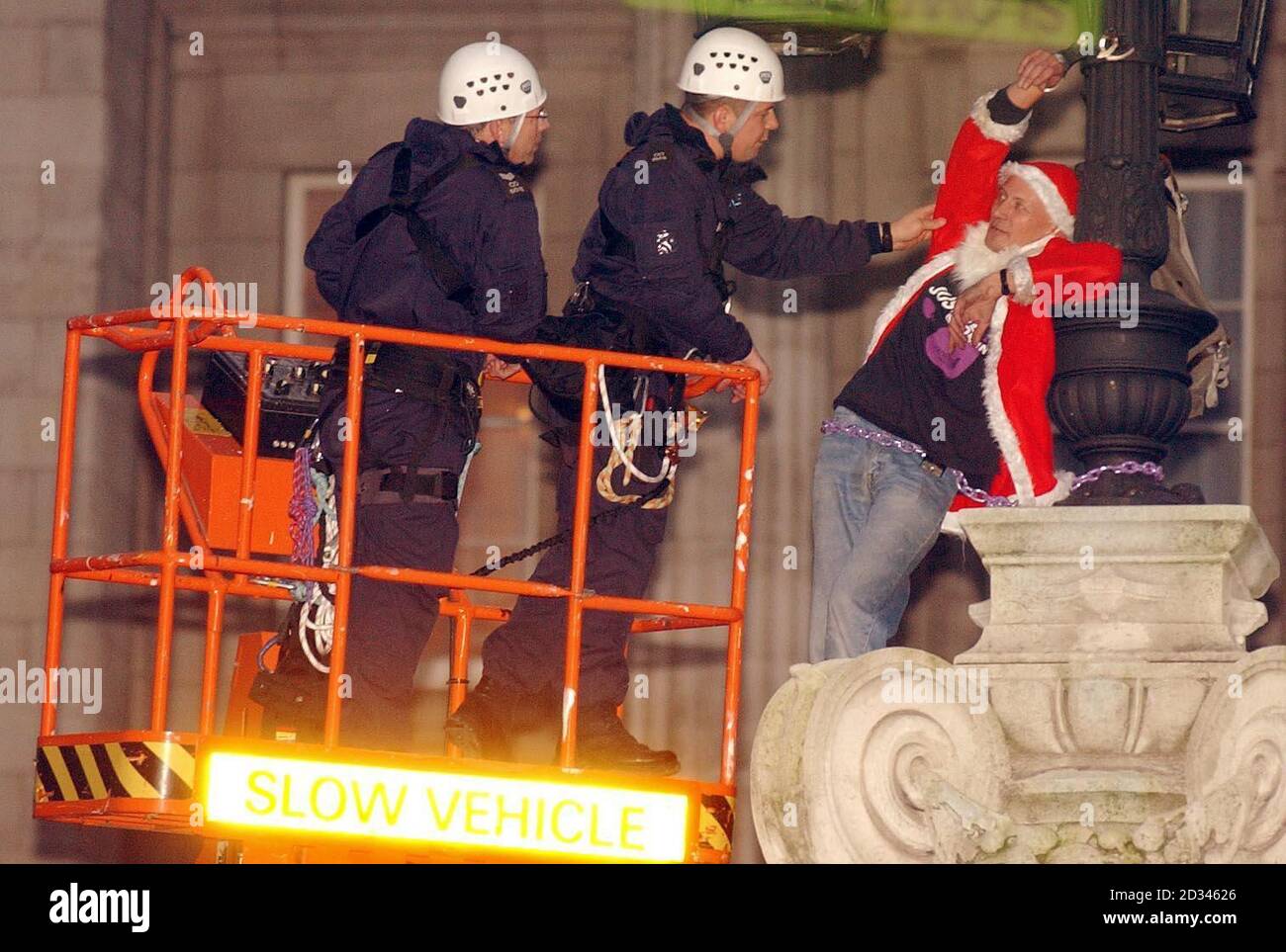 David Pyke from the fathers 4 justice campaign, is talked to by Police ...