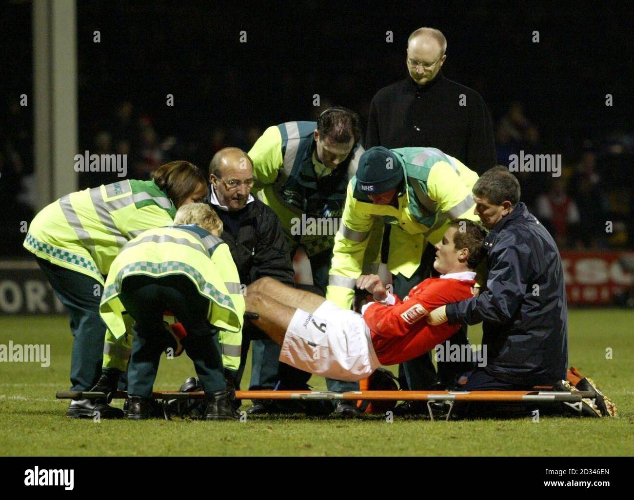 Rotherham United's Martin Butler is lifted onto a stretcher after being ...
