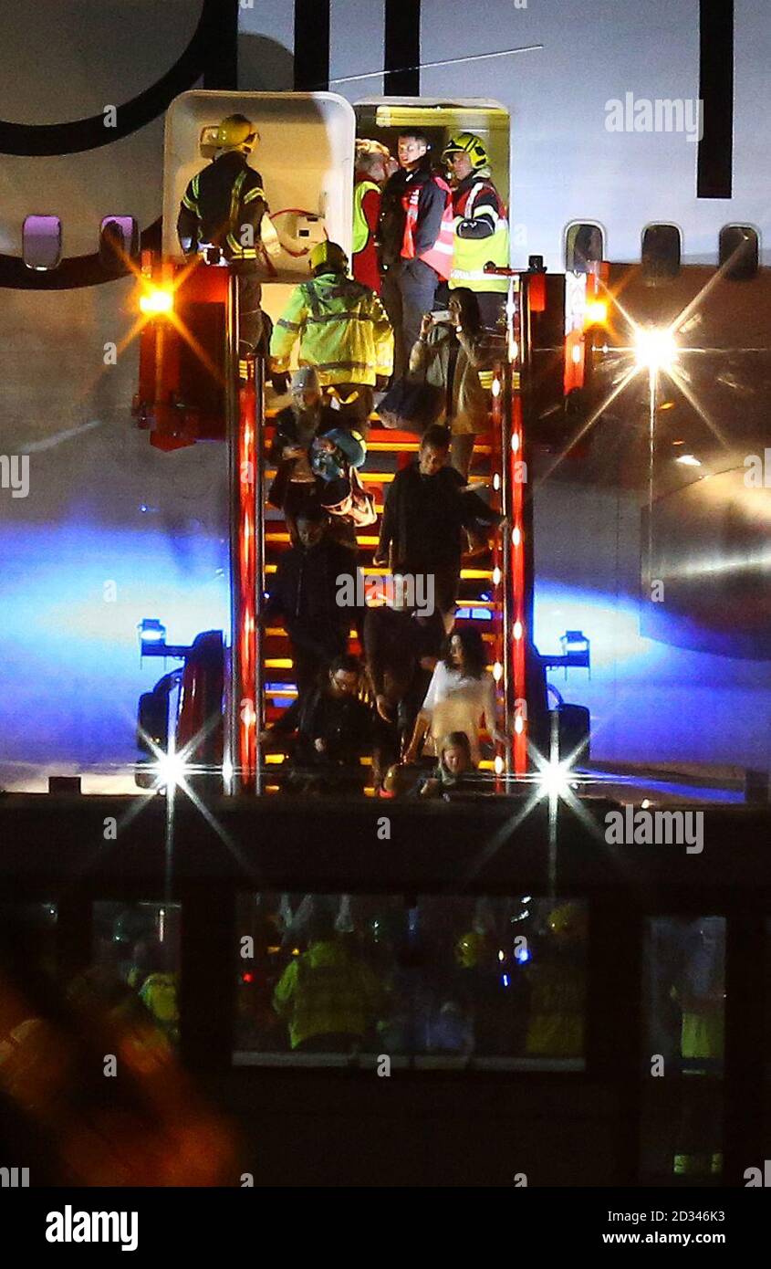 ALTERNATIVE CROP. Passengers leave Flight VS43, a Boeing 747 jumbo jet ...