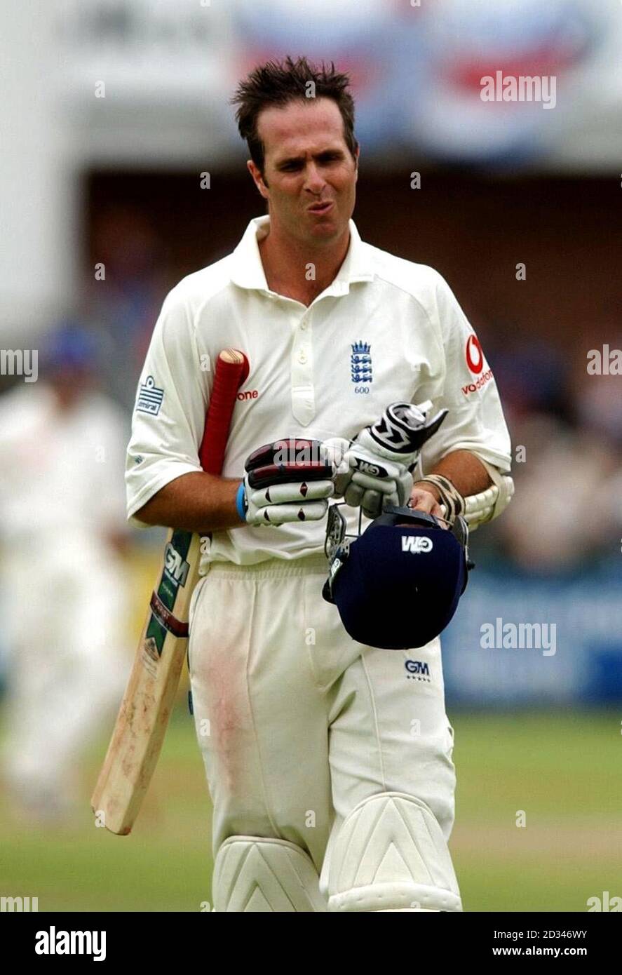 England captain Michael Vaughan reacts after being clean bowled by ...