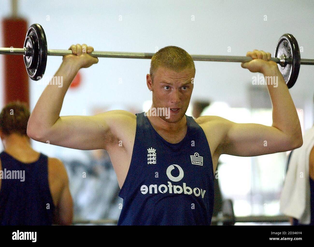 England cricketer Andrew Flintoff lifts weights during a team session ...