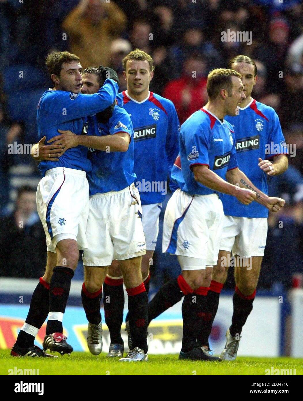 Rangers' Nacho Novo (second left) celebrates his second goal ...