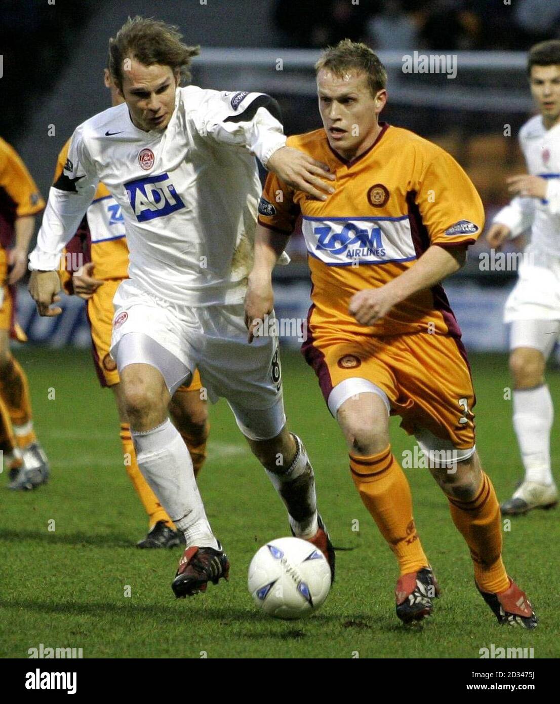 Aberdeen's Markus Heikkinen challenges Motherwell's Steven Hammell ...
