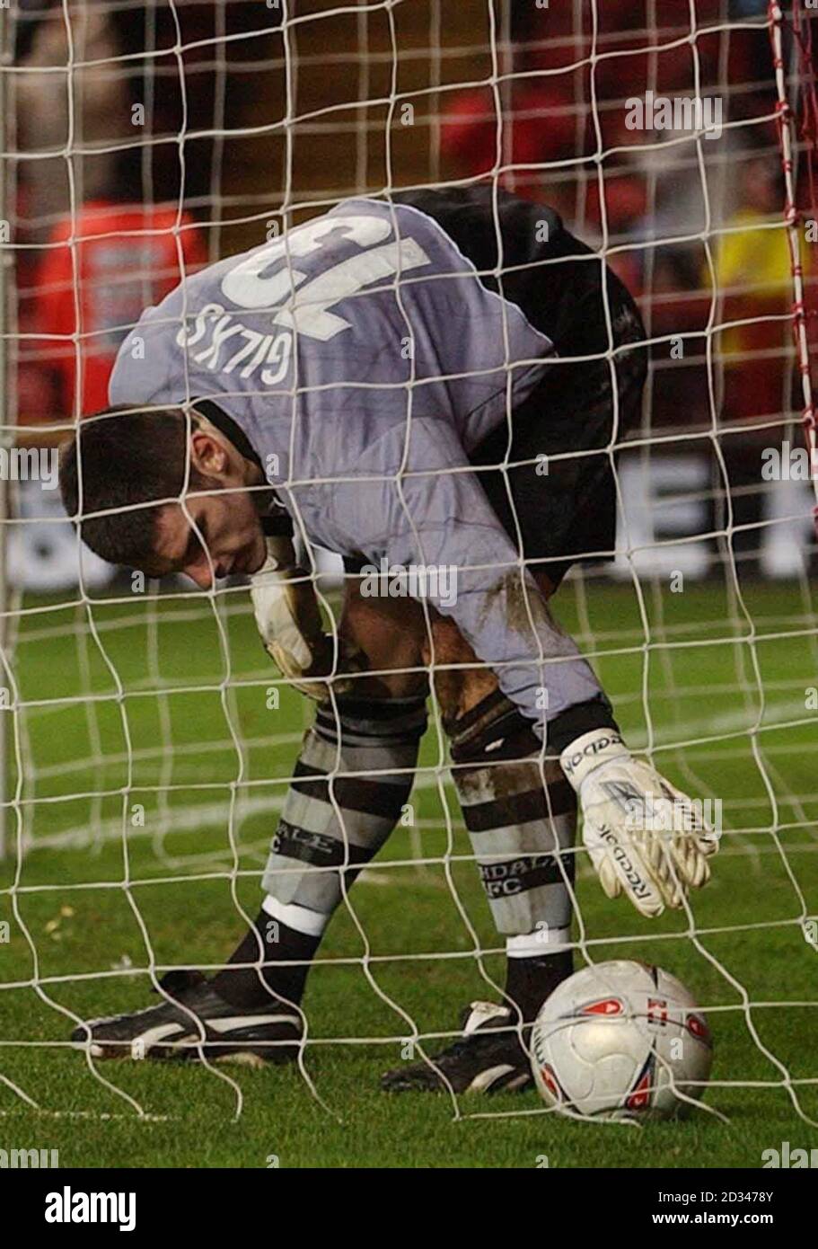 Rochdale goaleeper matthew gilks fishes ball out hi-res stock ...