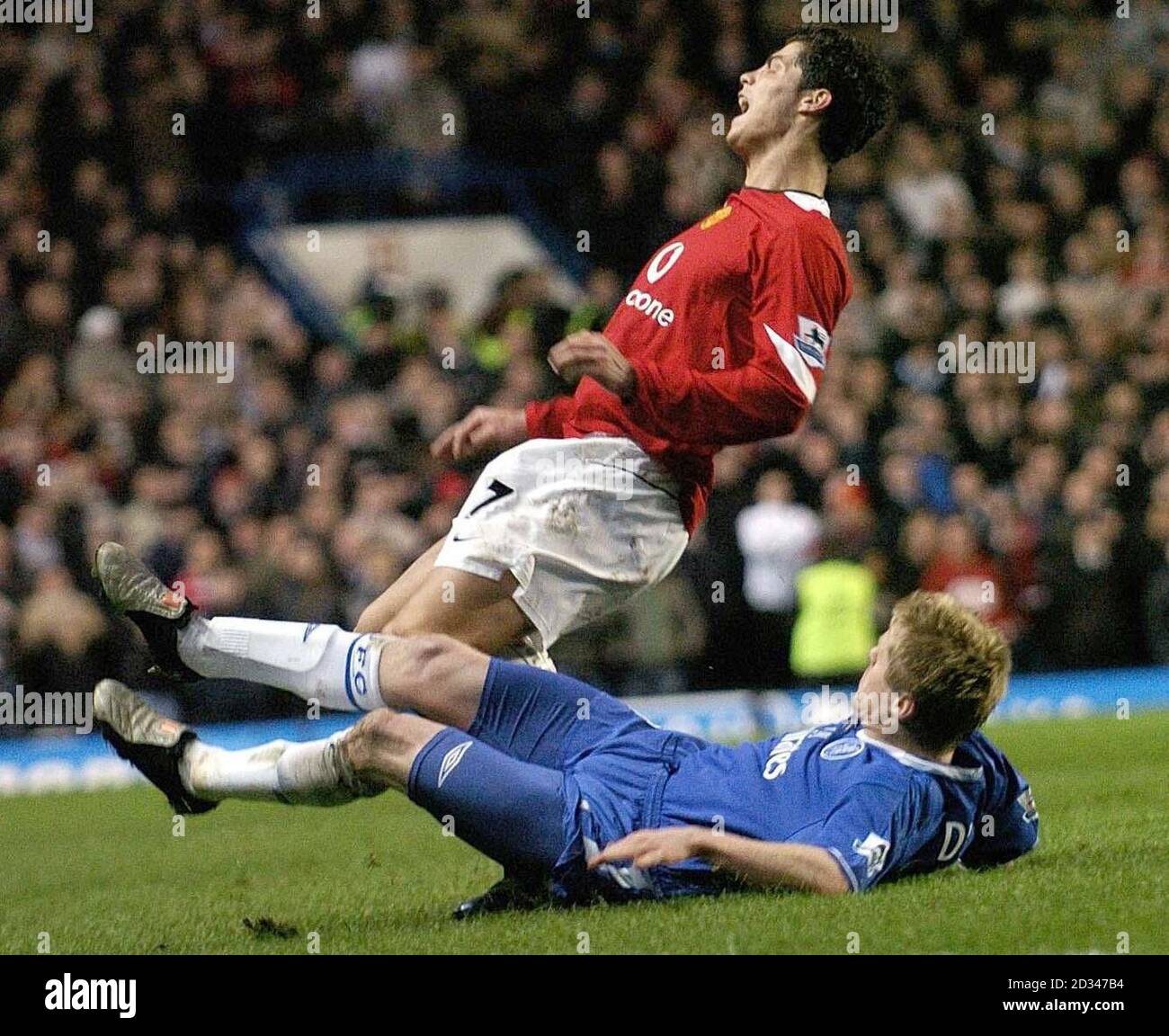 Manchester United's Cristiano Ronaldo is tackled by Chelsea's Damien ...