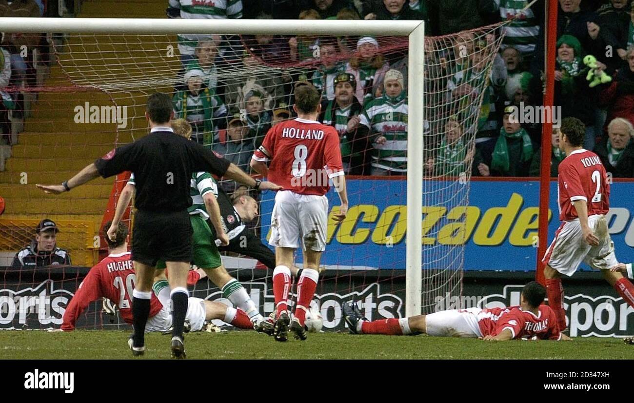 Yeovil's Paul Terry (hidden behind referee) scores Stock Photo - Alamy