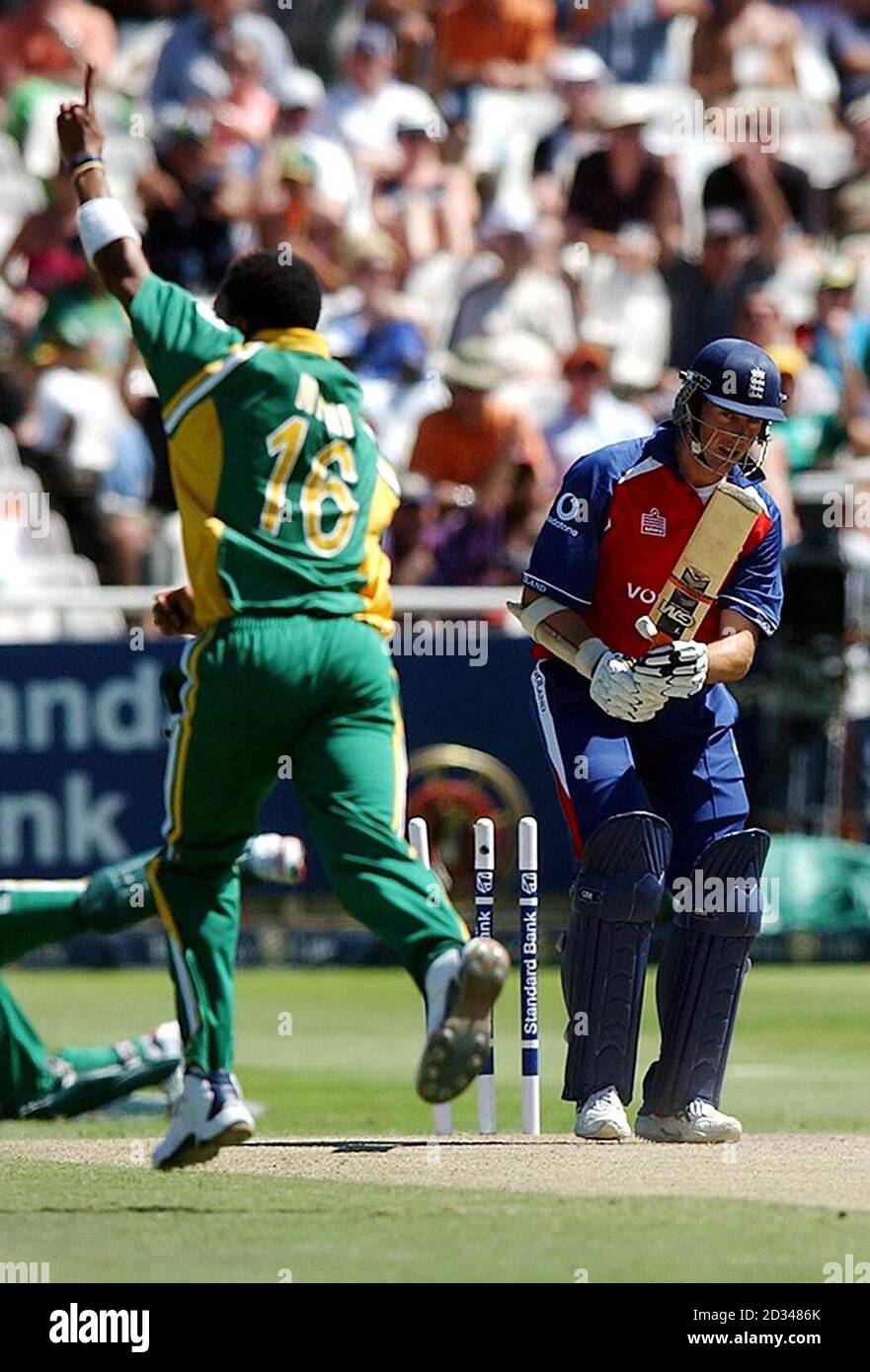 South Africa's Makhaya Ntini (left) celebrates after bowling England's ...