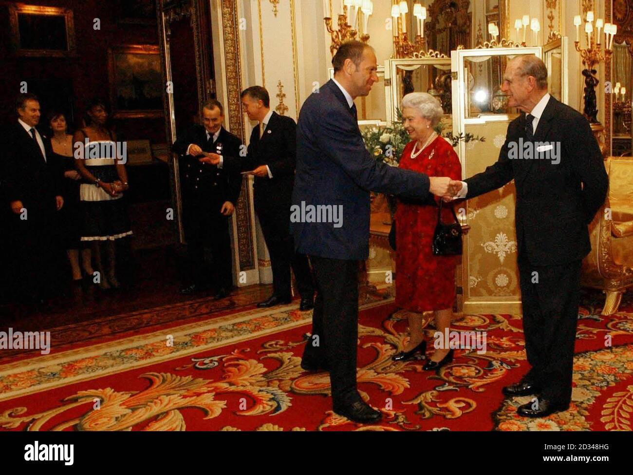 Prince Philip greets Sir Steven Redgrave, in the White drawing room ...