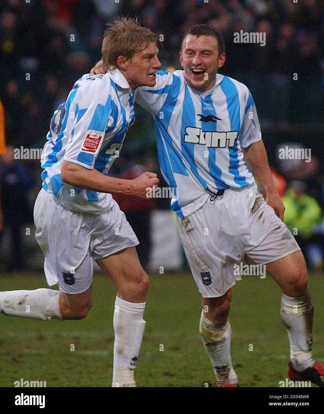Brighton's Gary Hart (right) celebrates his goal with Daniel Harding ...