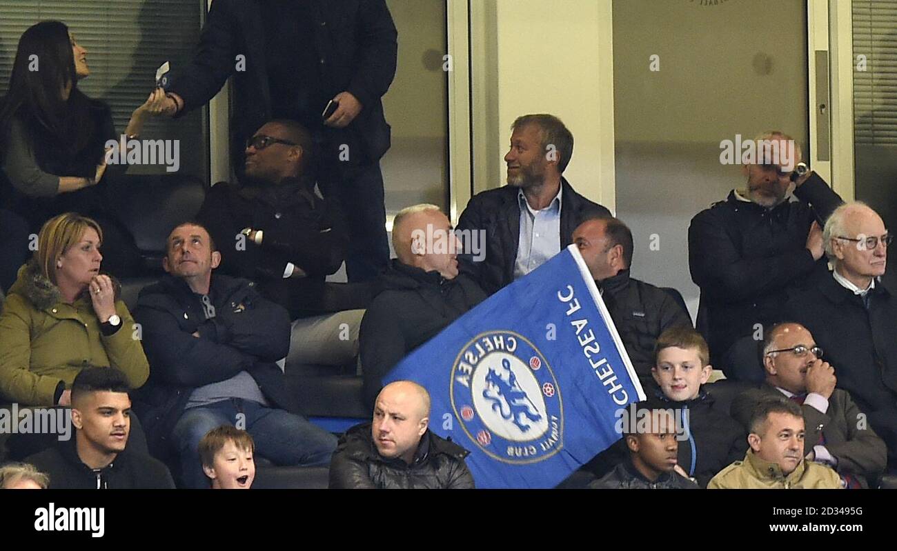 Chelsea's owner Roman Abramovich (centre) and chairman Bruce Buck (far ...