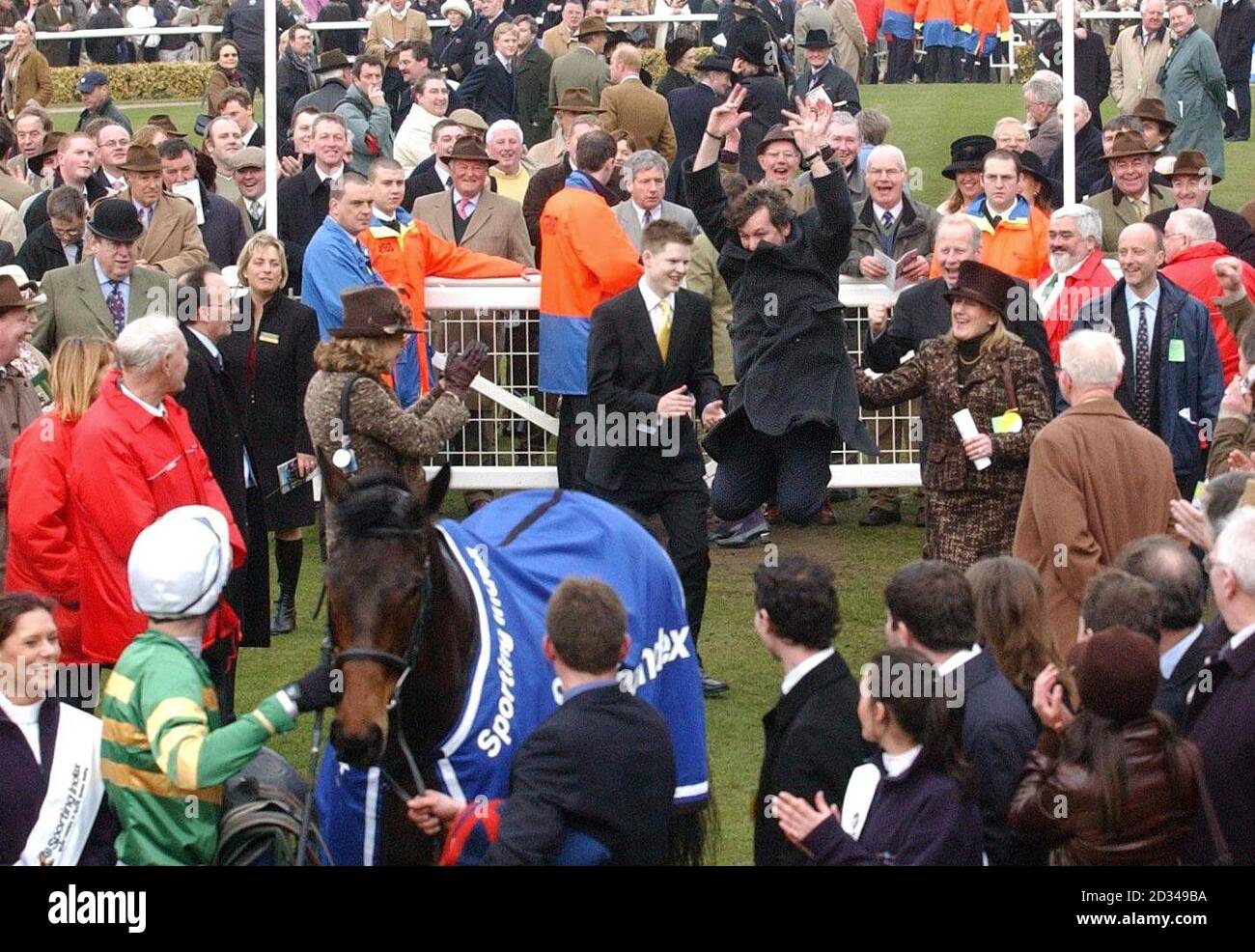 Trainer Enda Bolger jumps in celebration after his horse Spot The ...