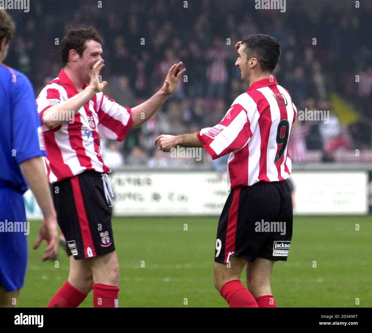 Lincoln City's Lee Beevers (L) congratulates team-mate Simon Yeo on his ...