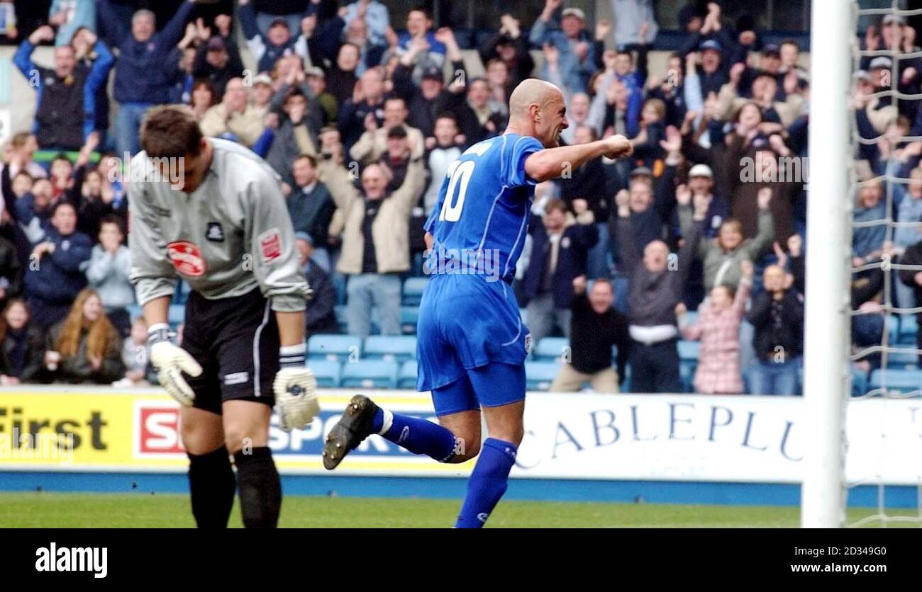 Millwall's Danny Dichio (right) celebrates his goal as Plymouth ...