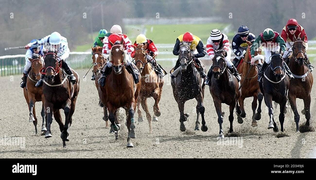Temper Tantrum and Jockey Richard Quinn (second left) wins the ITV ...