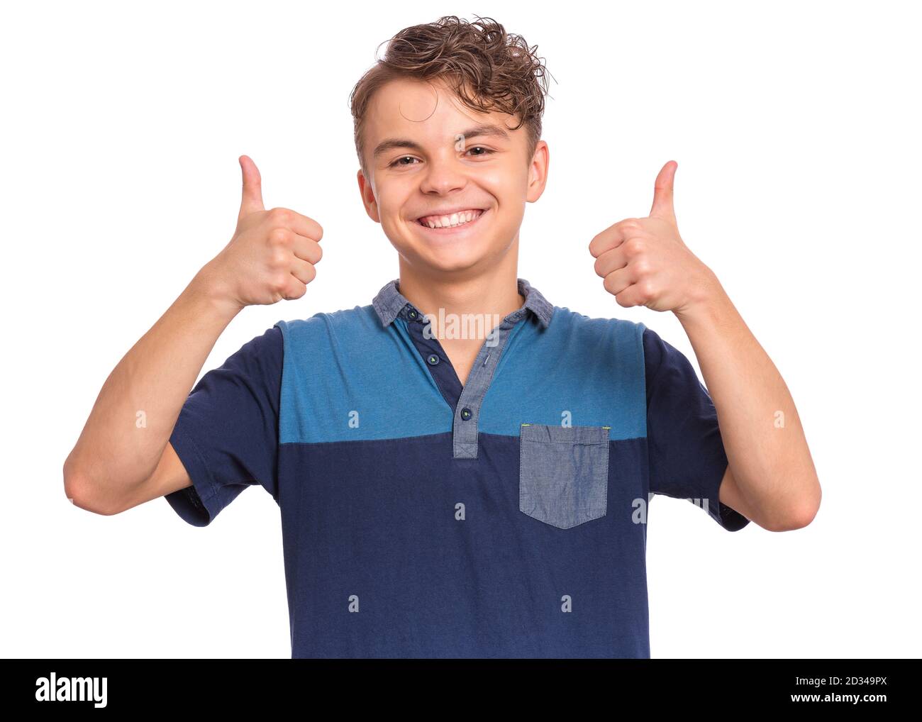 Cute teen boy pointing up, gesturing idea or doing number one gesture ...