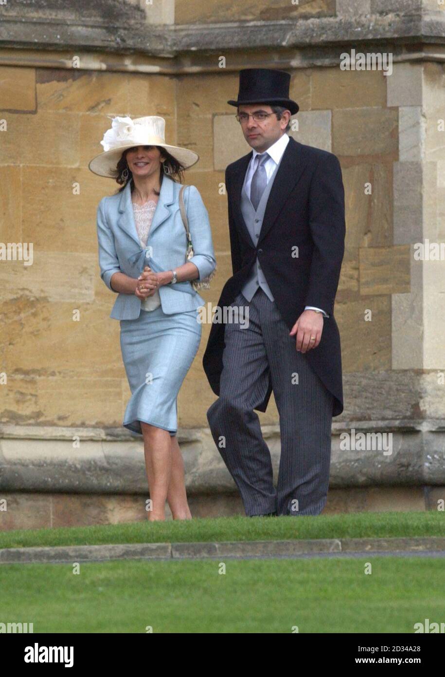 Rowan Atkinson and wife Senetra arrive at St George's Chapel, for the ...