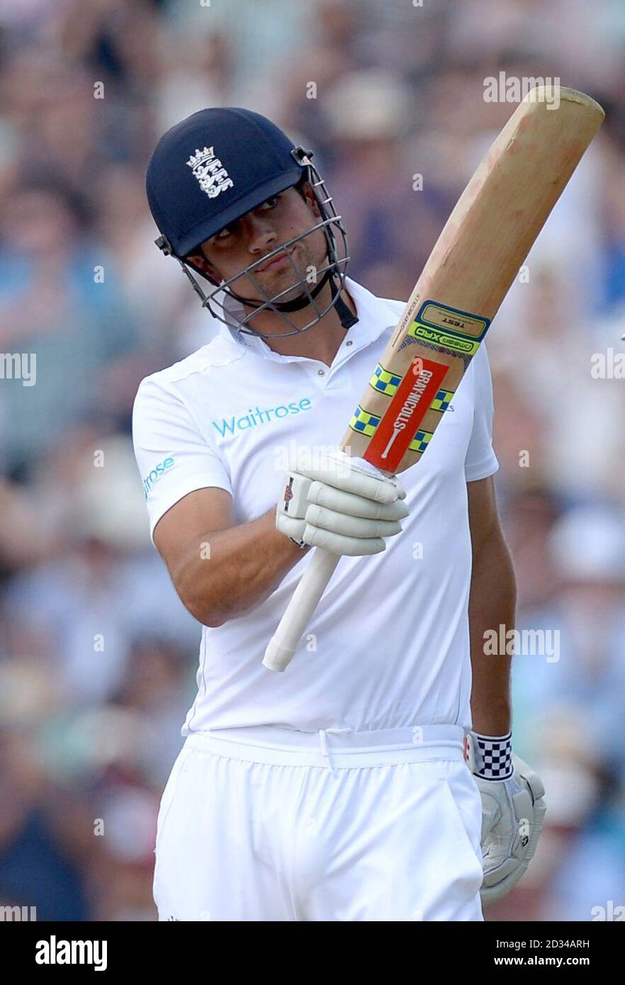 England's captain Alastair Cook celebrates scoring 50 not out during ...