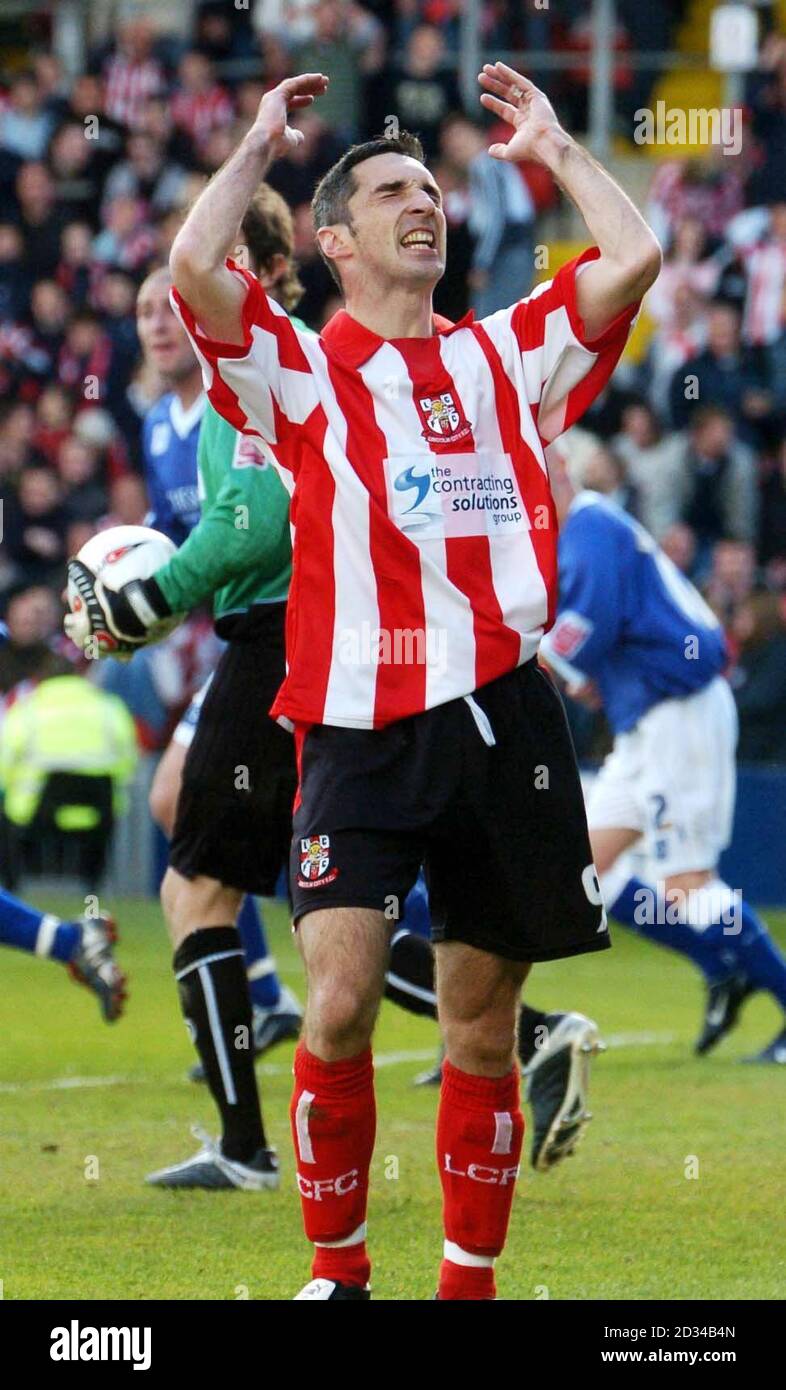 Lincoln City's Simon Yeo shows his frustration after a missed ...
