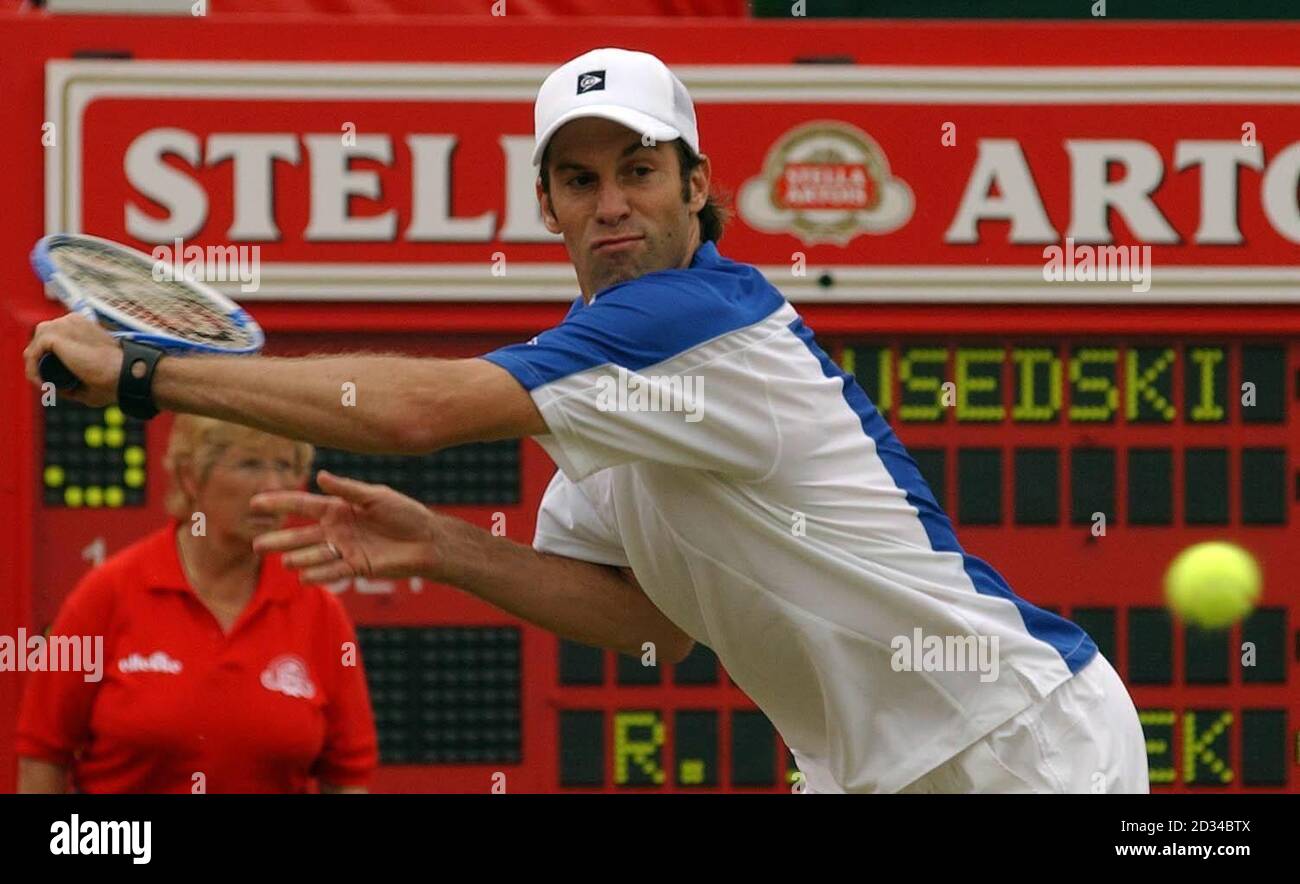 Great Britain's Greg Rusedski stretches for a backhand shot Stock Photo ...