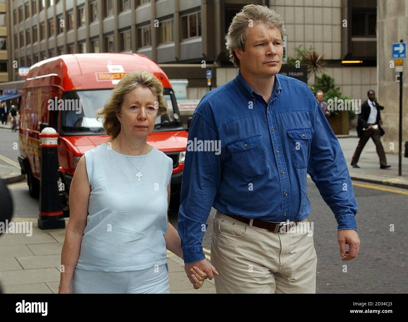 Sion Jenkins (right), 47 and his wife Christina arrive. The former ...