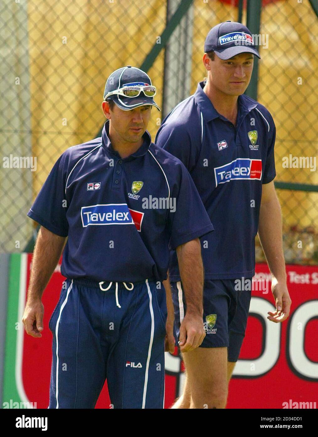 Australia's Stuart Clark (R) passes captain Ricky Ponting Stock Photo ...