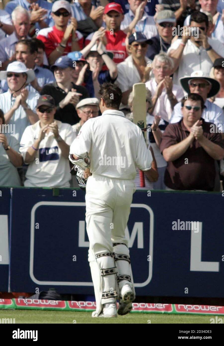England's Michael Vaughan leaves the pitch after scoring 166 during the ...