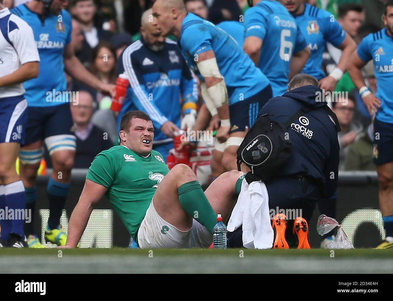 Ireland's Jack McGrath receives medical attention during the 2016 RBS 6 ...