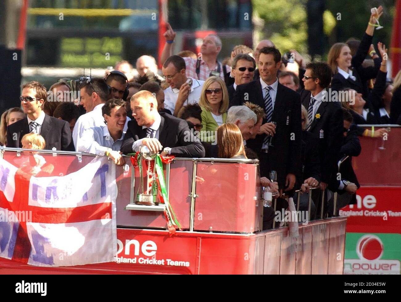 The English Cricket team celebrate during the Ashes victory parade in ...
