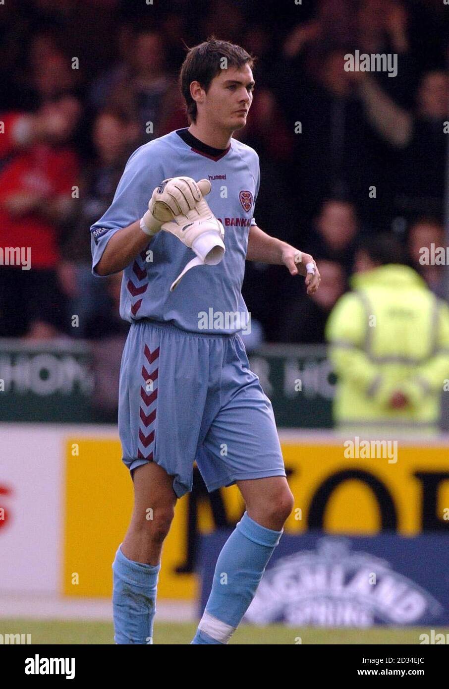 Heart's goalkeeper Craig Gordon leaves the pitch after being sent-off ...