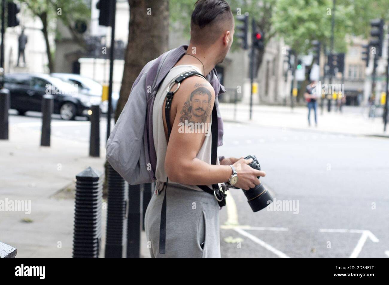 Photographer Julien Boudet arriving at the Nasir Mazhar Spring / Summer ...