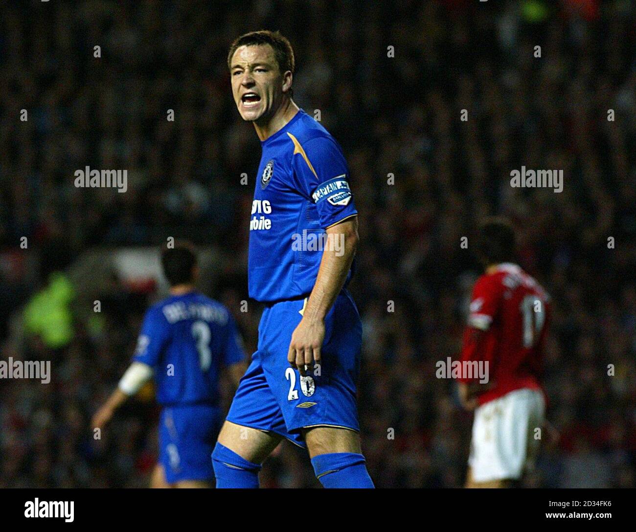 Chelsea captain John Terry tries to rally his team mates Stock Photo ...
