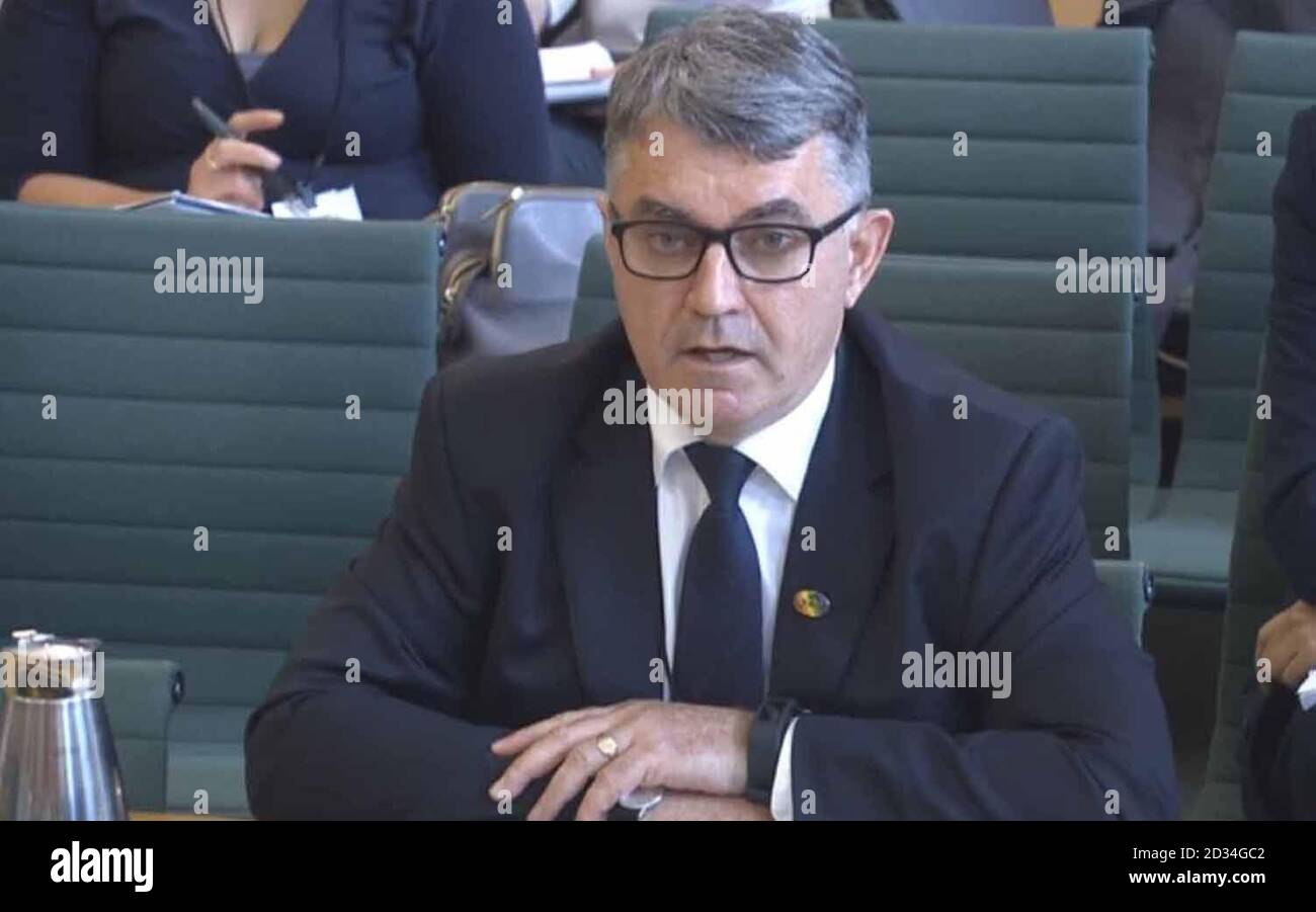 RMT general secretary Mick Cash in front of the Transport Select ...