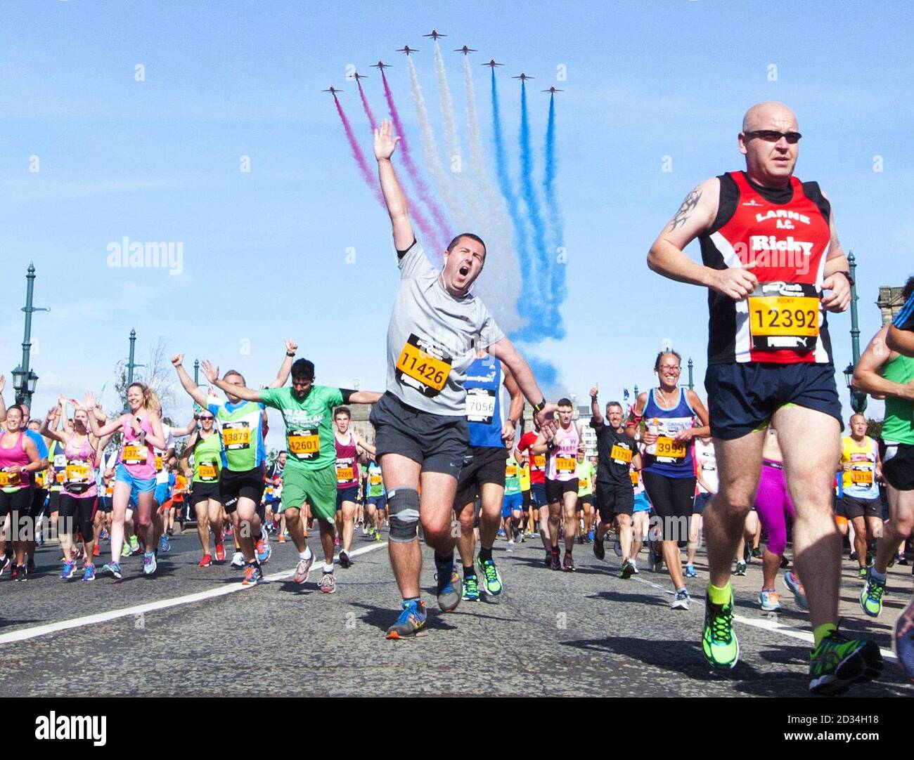The Red Arrows fly over the Tyne Bridge during the Great North Run in ...