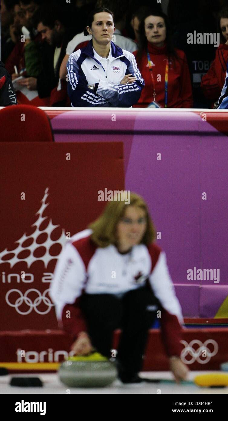 Great Britain's Lynn Cameron (top) watches the women's curling match ...