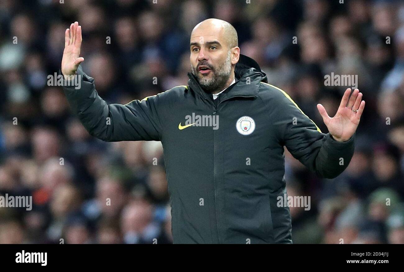 Manchester City manager Pep Guardiola gestures on the touchline during ...