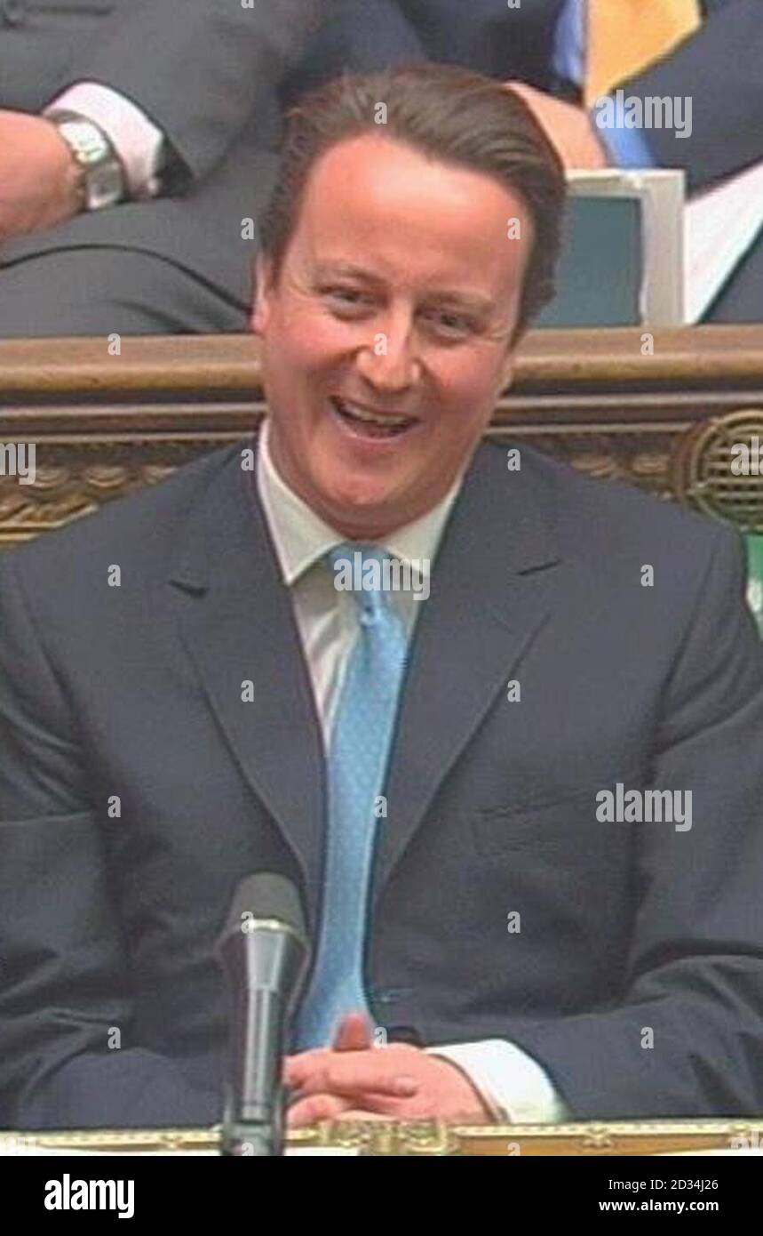 Conservative Party leader David Cameron laughs during Prime Minister's ...