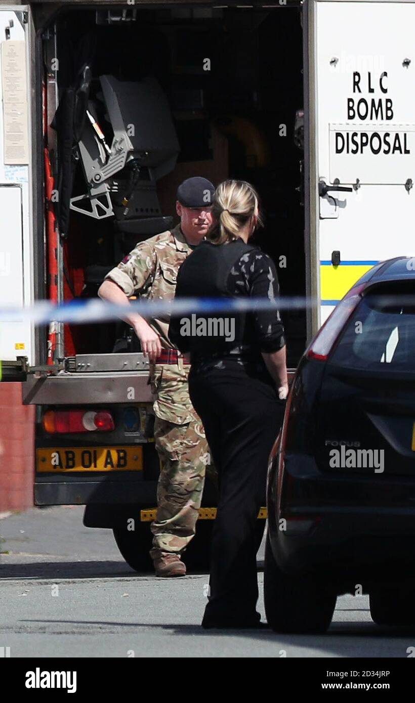 Police activity at a cordon in the Moss Side area of Manchester where ...