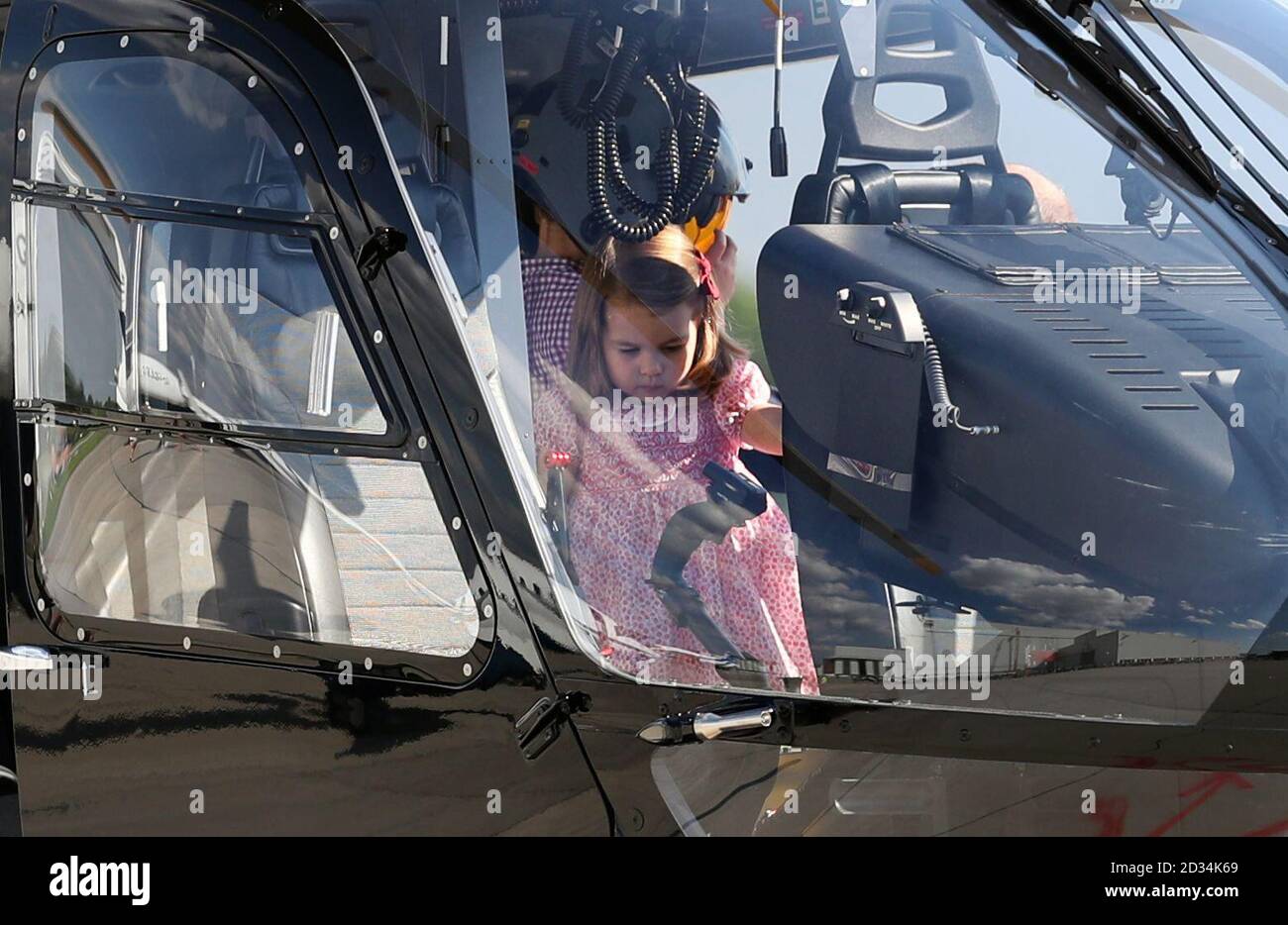 Princess Charlotte sits in a rescue helicopter as she visits Airbus in ...