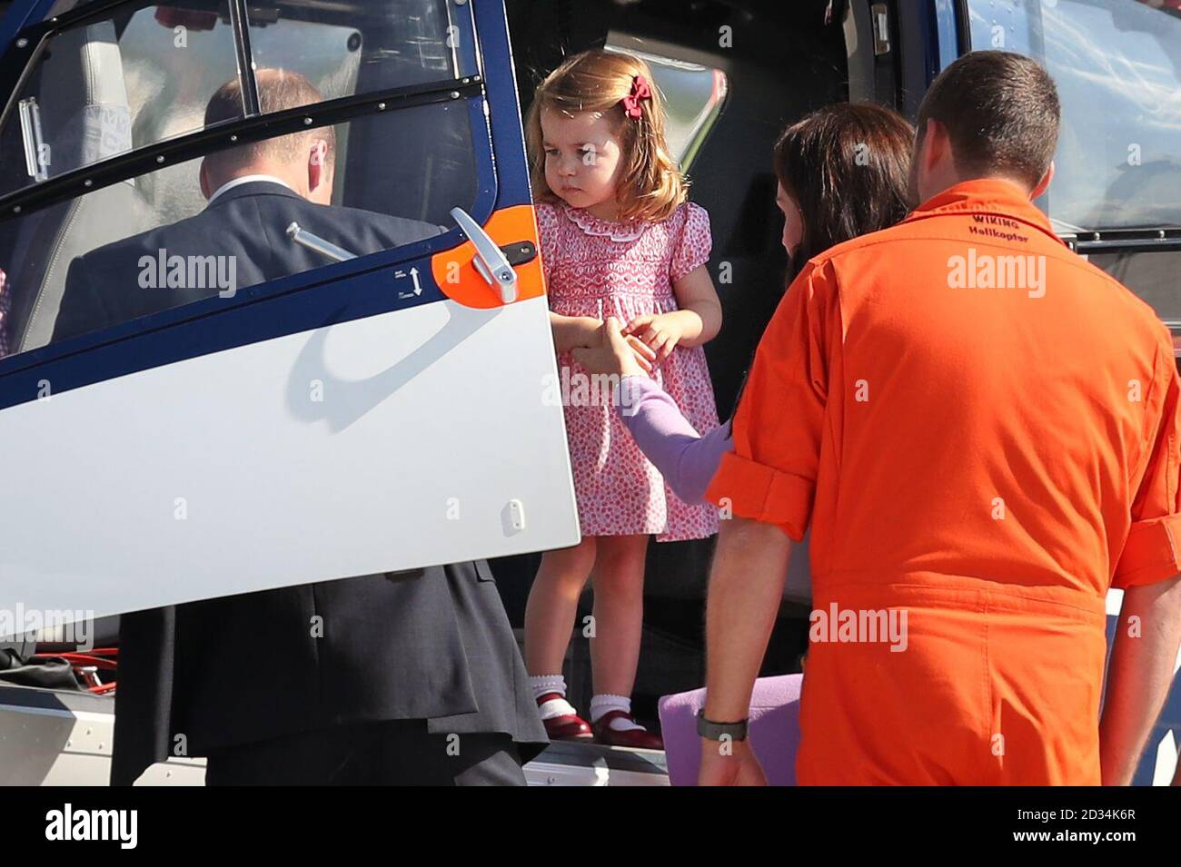 Princess Charlotte on a helicopter before the Royal party departed from ...