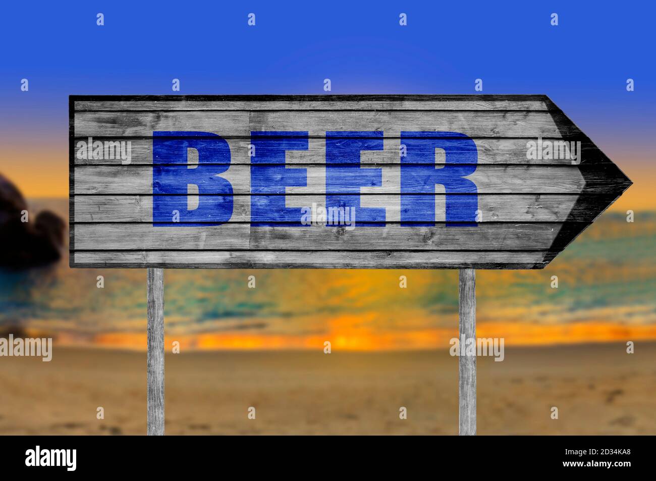 Beer wooden sign with on a beach background Stock Photo - Alamy