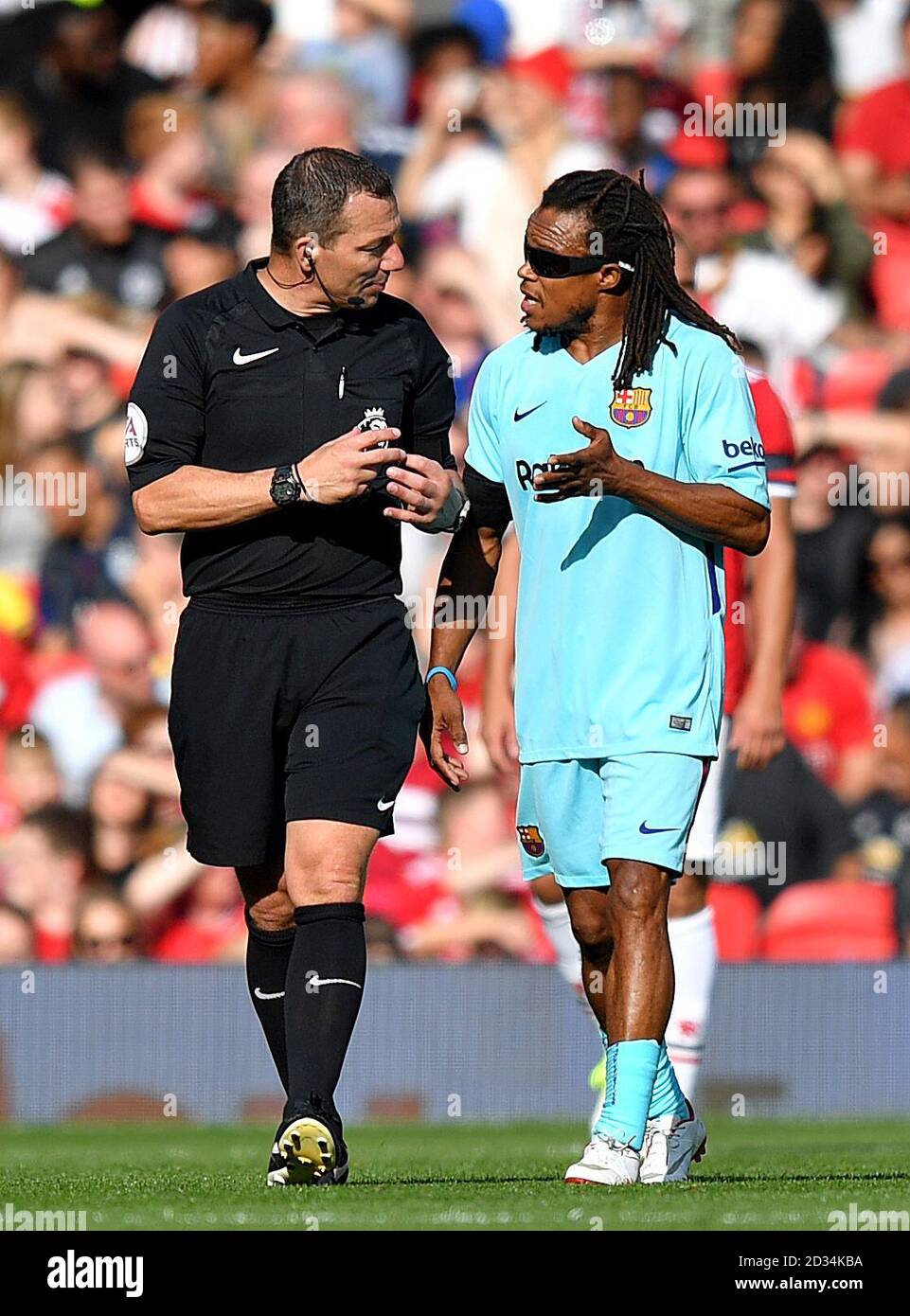 Barcelona's Edgar Davids (right) with match referee Kevin Friend (left ...