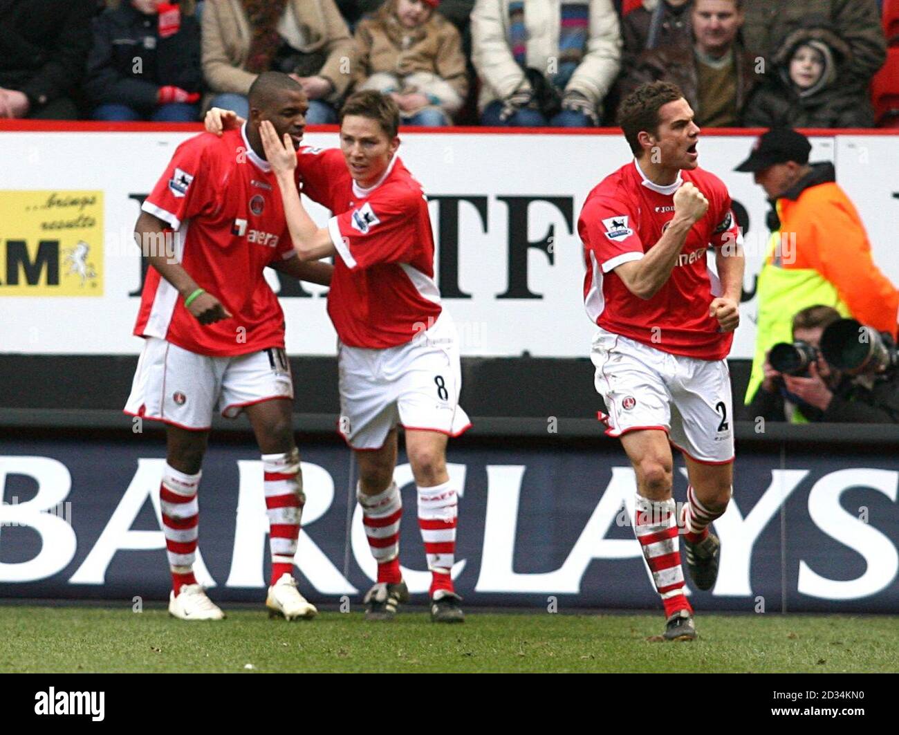 Charlton Athletic's Matthew Holland congratulates goal scorer Darren ...