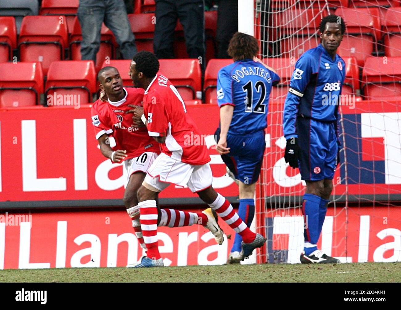Charlton Athletic's Jason Euell congratulates goal scorer Darren Bent ...
