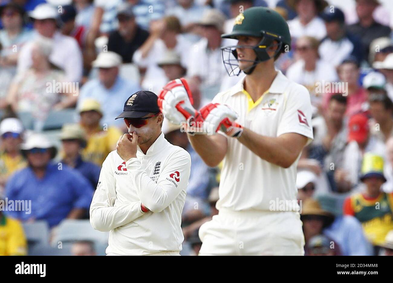 England's Joe Root looks dejected in the field during day three of the ...